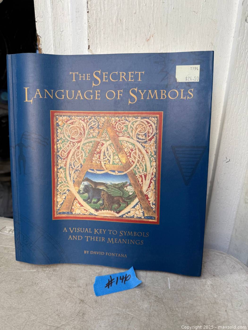The Secret Language of Symbols book | Maxsold