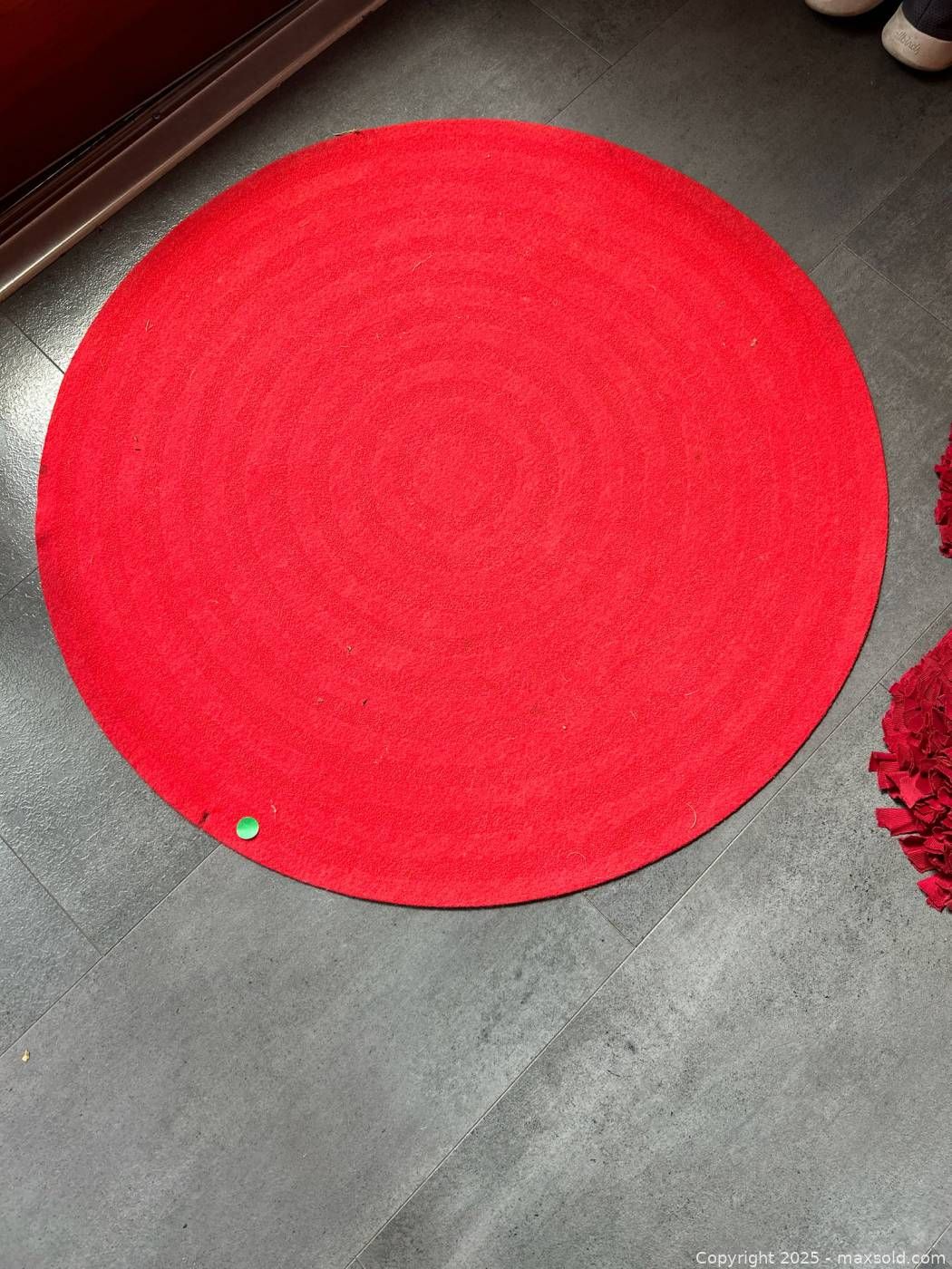 Pair of red rugs, round flat-weave and heart shag | Maxsold