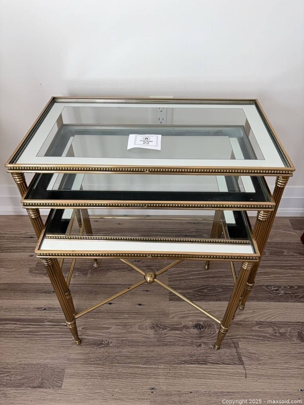 Brass and glass nesting tables | Maxsold