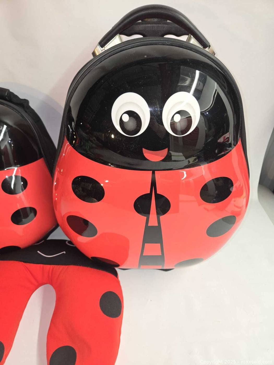 Heys Ladybug 18" carry-on, backpack, neck pillow | Maxsold