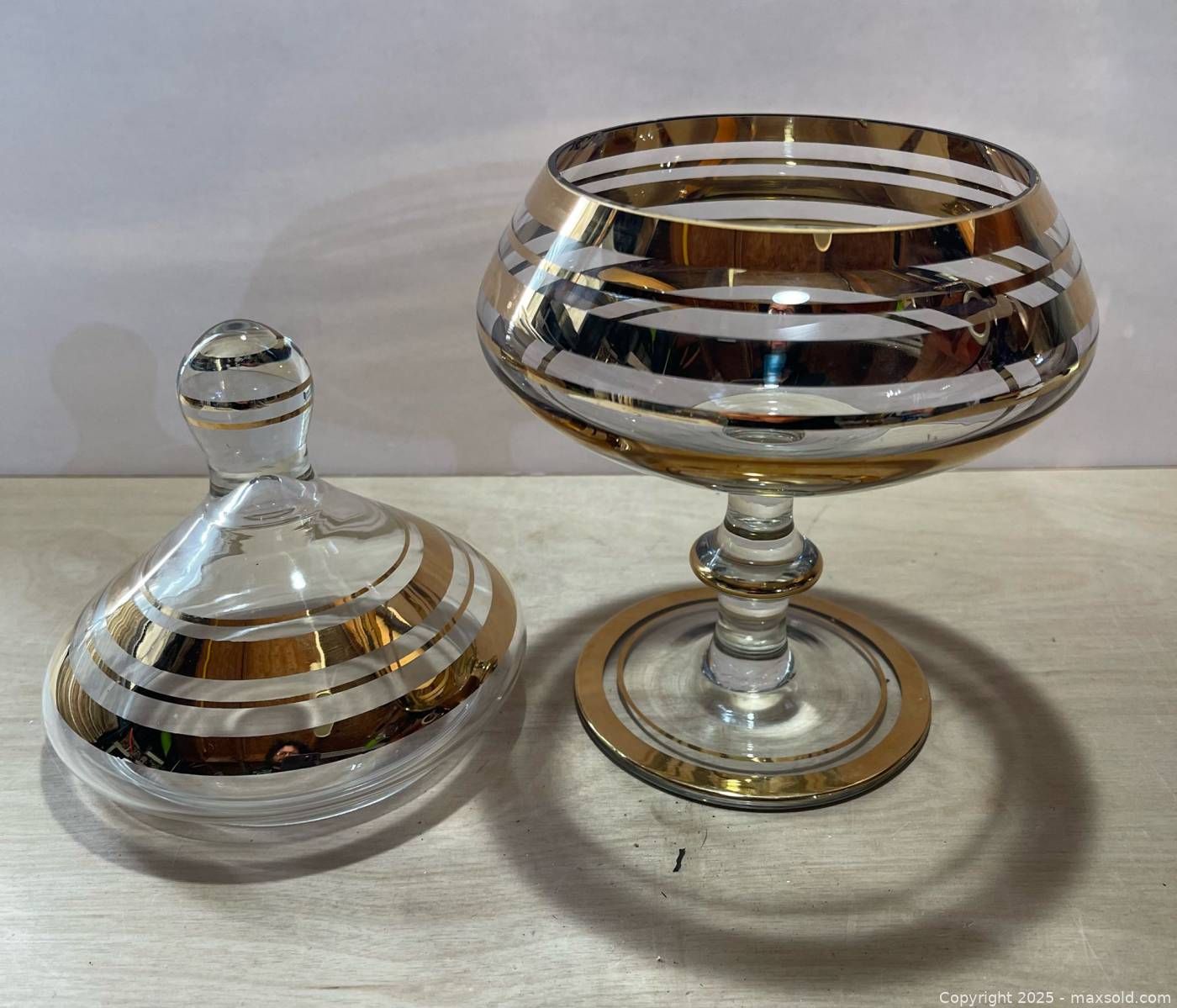 Clear and gold banded pedestal candy dish | Maxsold