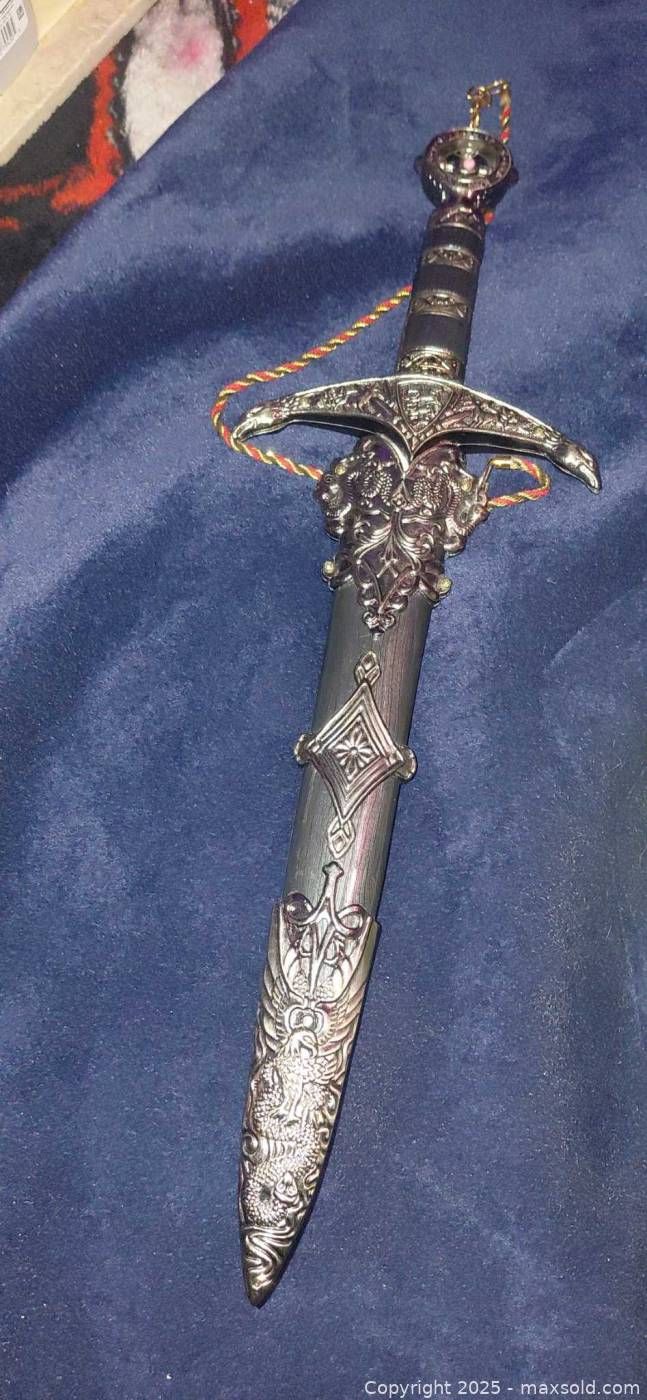 Ornate silver-tone dagger with scabbard | Maxsold