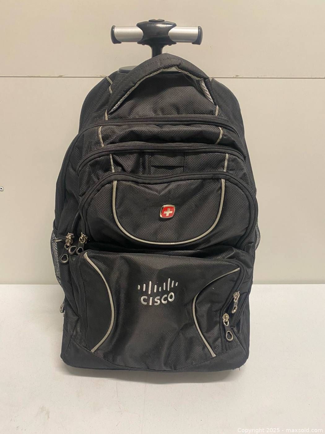 SwissGear rolling laptop backpack with Cisco logo | Maxsold