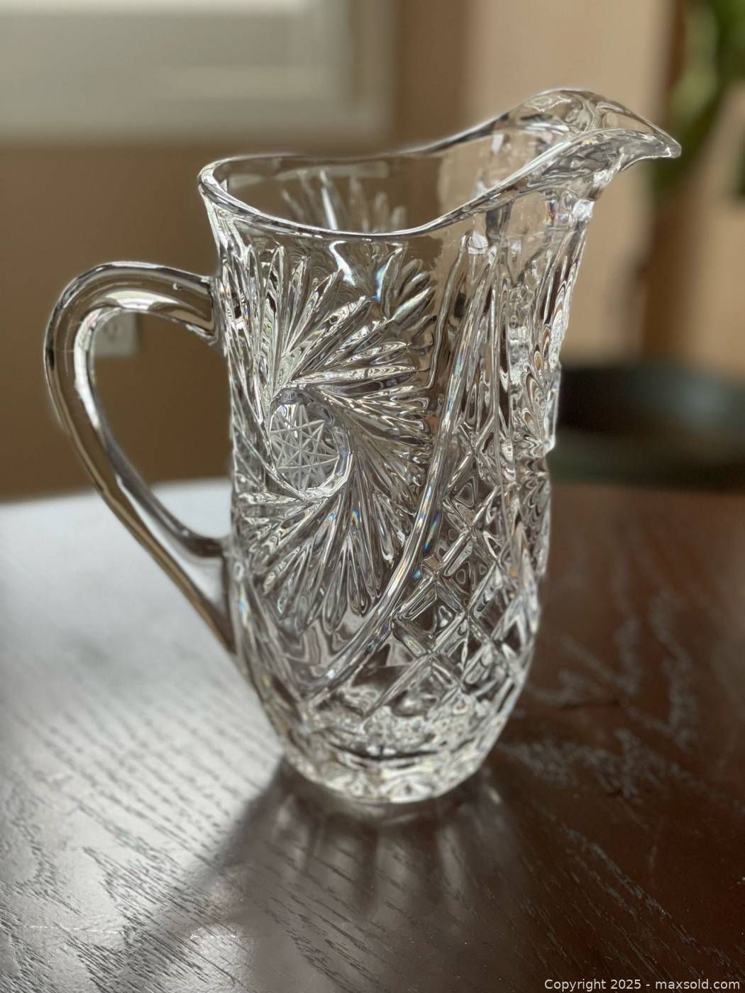 Pair of cut crystal water pitchers | Maxsold