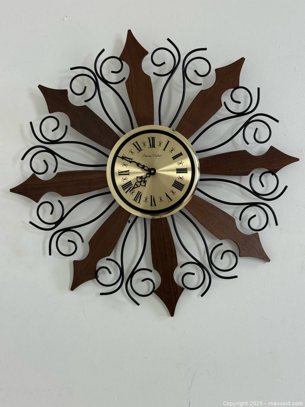 Vintage Phinney Walker sunburst wall clock | Maxsold