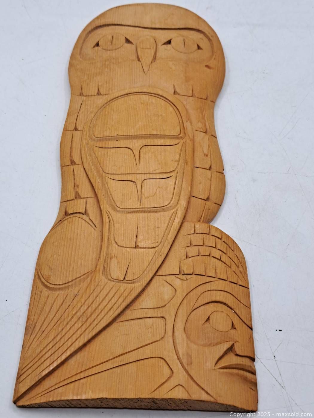 Carved Salish wood panel signed Tyrone Joseph 1990 | Maxsold
