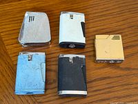 Vintage Ronson and IM Corona Butane Lighters | Maxsold