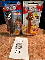 Sealed PEZ Venom & Poop Emoji Dispensers | Maxsold