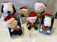Peanuts Charlie Brown and Snoopy plush toys | Maxsold