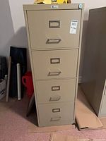 Commander metal 4-drawer filing cabinet | Maxsold