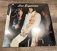 Elvis Presley “Live Experience” sealed LP | Maxsold
