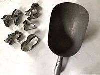 Antique Tin Cookie Cutters And Aluminum Grain Scoop | Maxsold