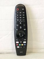 Smart TV remote control with box | Maxsold