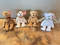 Ty 9" plush bears with tags, 4 pcs | Maxsold