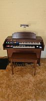 Conn electric home organ with bench | Maxsold