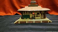 Ceramic train station model building | Maxsold