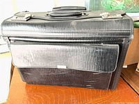 Black Faux Leather Rolling Pilot Case Briefcase | Maxsold