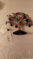Family tree photo frame, pewter figurine, mirror base | Maxsold