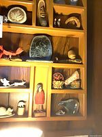 Wooden display shelf with Canadiana miniatures | Maxsold