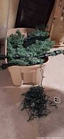 6–7 ft Artificial Christmas Tree, Tub, Lights | Maxsold