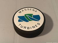 Vintage Massena Turbines Junior A hockey puck | Maxsold