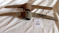 Two forged steel pick axe heads | Maxsold