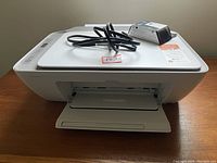 HP DeskJet 2700e All-in-One Printer with Black Ink Cartridge | Maxsold