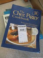 Cookbook Lot Including The Chez Piggy Cookbook and Others | Maxsold