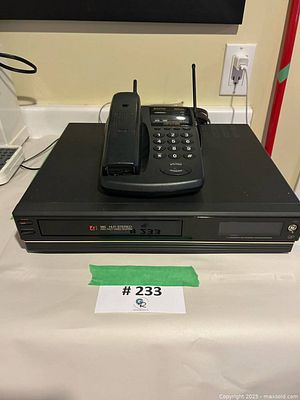 Sanyo cordless phone and GE VHS player | Maxsold