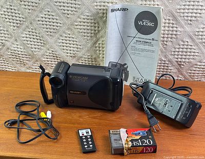 Sharp Viewcam 8 Camcorder VL-E36C With Accessories | Maxsold