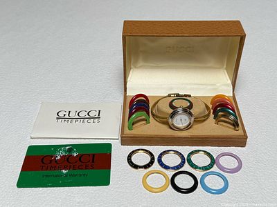 Gucci 1100L women’s watch w/ bezel set | Maxsold