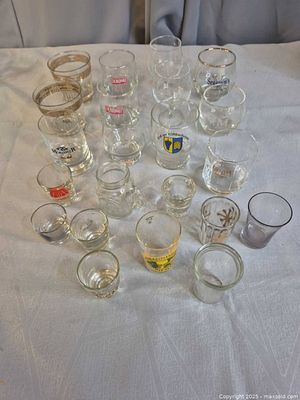 Assorted branded bar and shot glasses | Maxsold