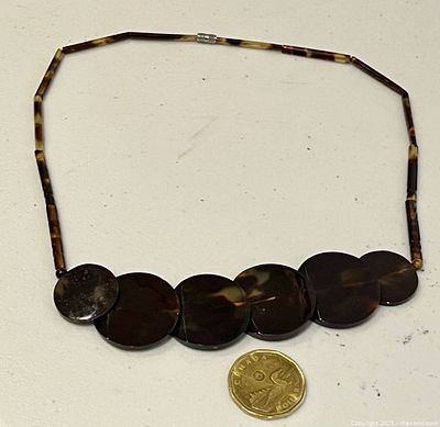 Vintage tortoiseshell-look plastic disc necklace | Maxsold