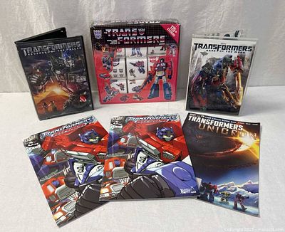 Transformers DVDs, comics & sticker set | Maxsold