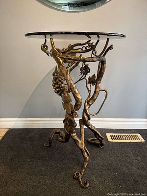 Mid-century iron grapevine pedestal table | Maxsold