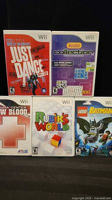 Wii games: Just Dance, LEGO Batman, Rubik's World, Puzzler Collection ...
