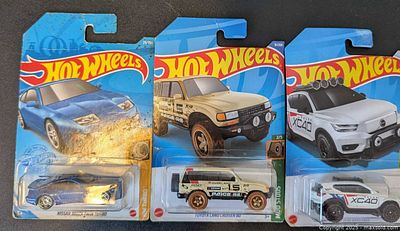 Hot Wheels Nissan coupe, Land Rover off-roader, Volvo XC40 – 3 | Maxsold