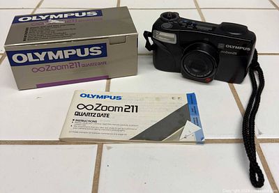 Olympus Infinity Zoom 211 Quartz Date 35mm Camera | Maxsold
