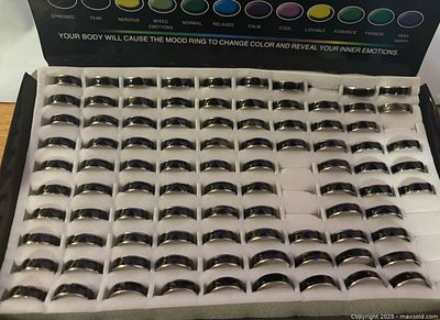 72 mood rings in display box, stickers, hair rings | Maxsold