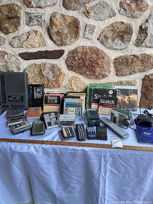 Vintage portable audio devices, tapes, remotes & camcorder | Maxsold