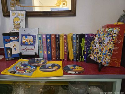 The Simpsons DVD seasons 1-14 & 20 with book and gift set | Maxsold