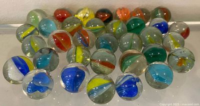Vintage small glass marbles | Maxsold