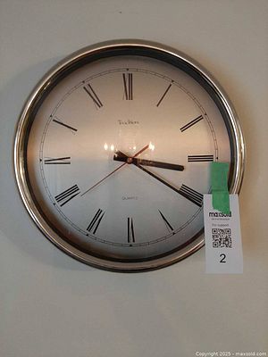 Tradition silver-tone quartz wall clock | Maxsold
