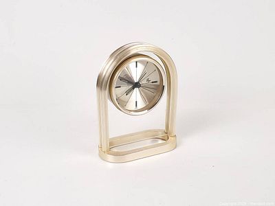 Ergo gold-tone arched quartz desk clock | Maxsold