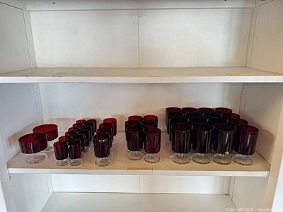 Large lot ruby red glass stemware | Maxsold