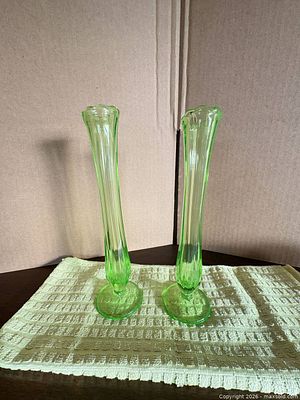 Pair uranium glass trumpet bud vases | Maxsold