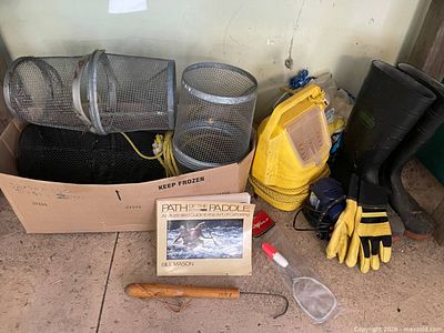 Outdoor gear, traps, boots, book, accessories | Maxsold