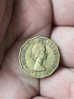 1956 United Kingdom brass threepence coin | Maxsold