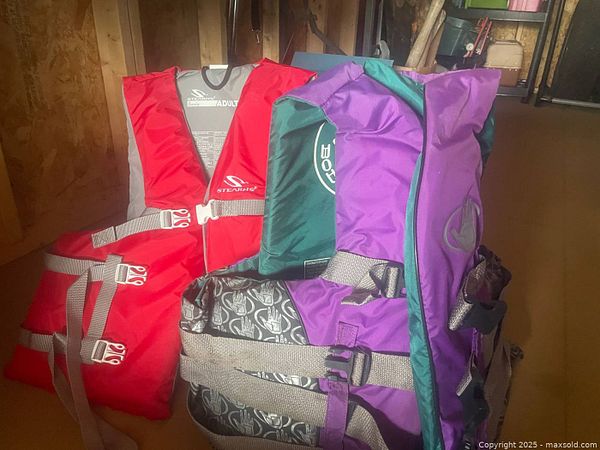 Two Oversized Adult Life Jackets, Red and Purple | Maxsold