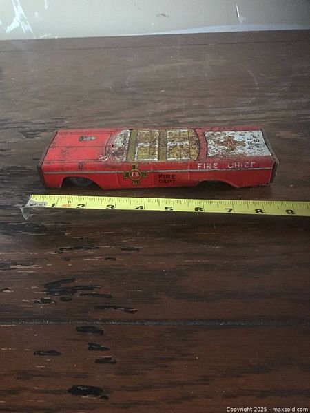 Vintage tin Fire Chief car | Maxsold